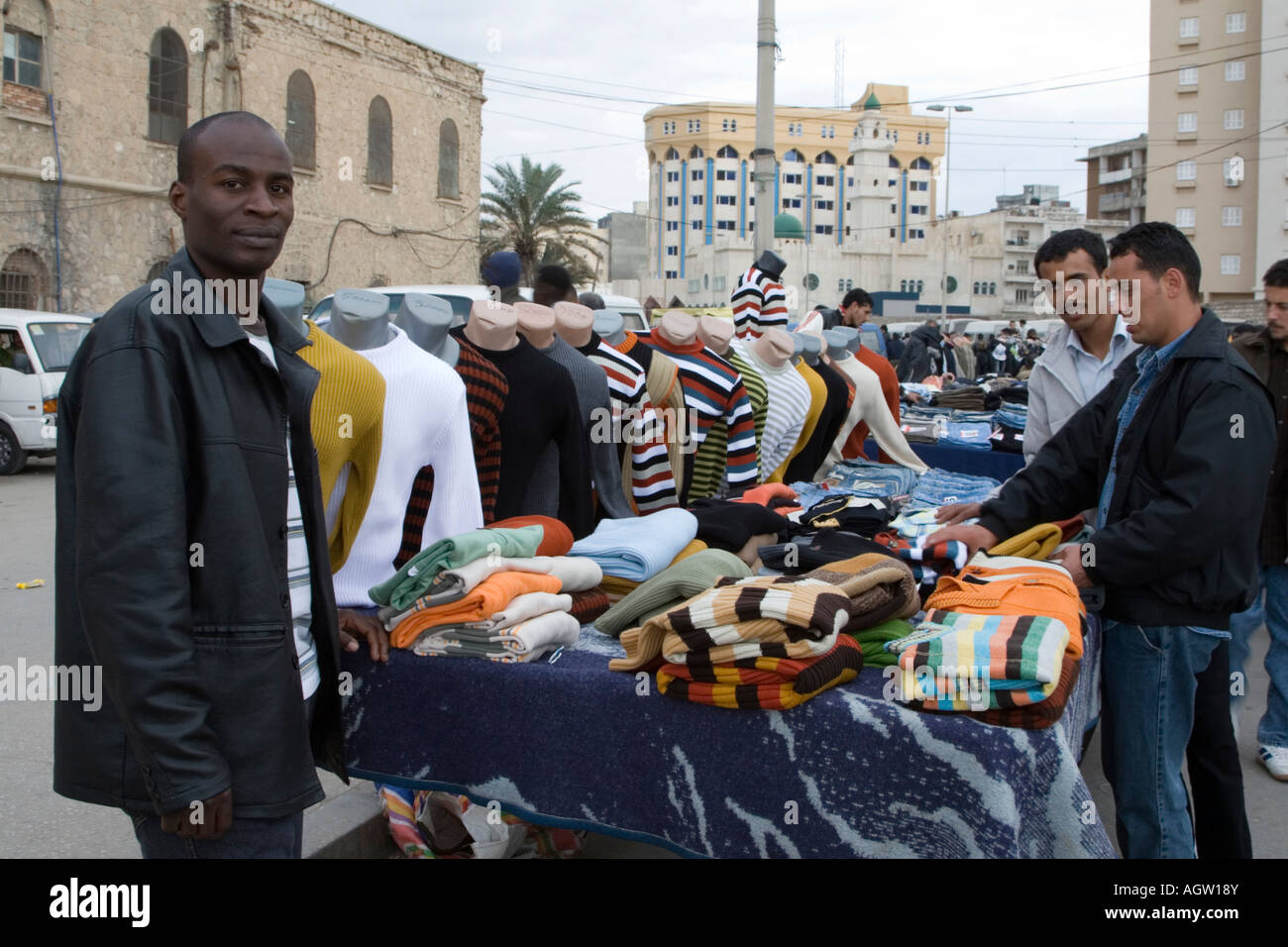 Tripoli, Libya. African Immigrant Clothing Vendor Stock Photo - Alamy