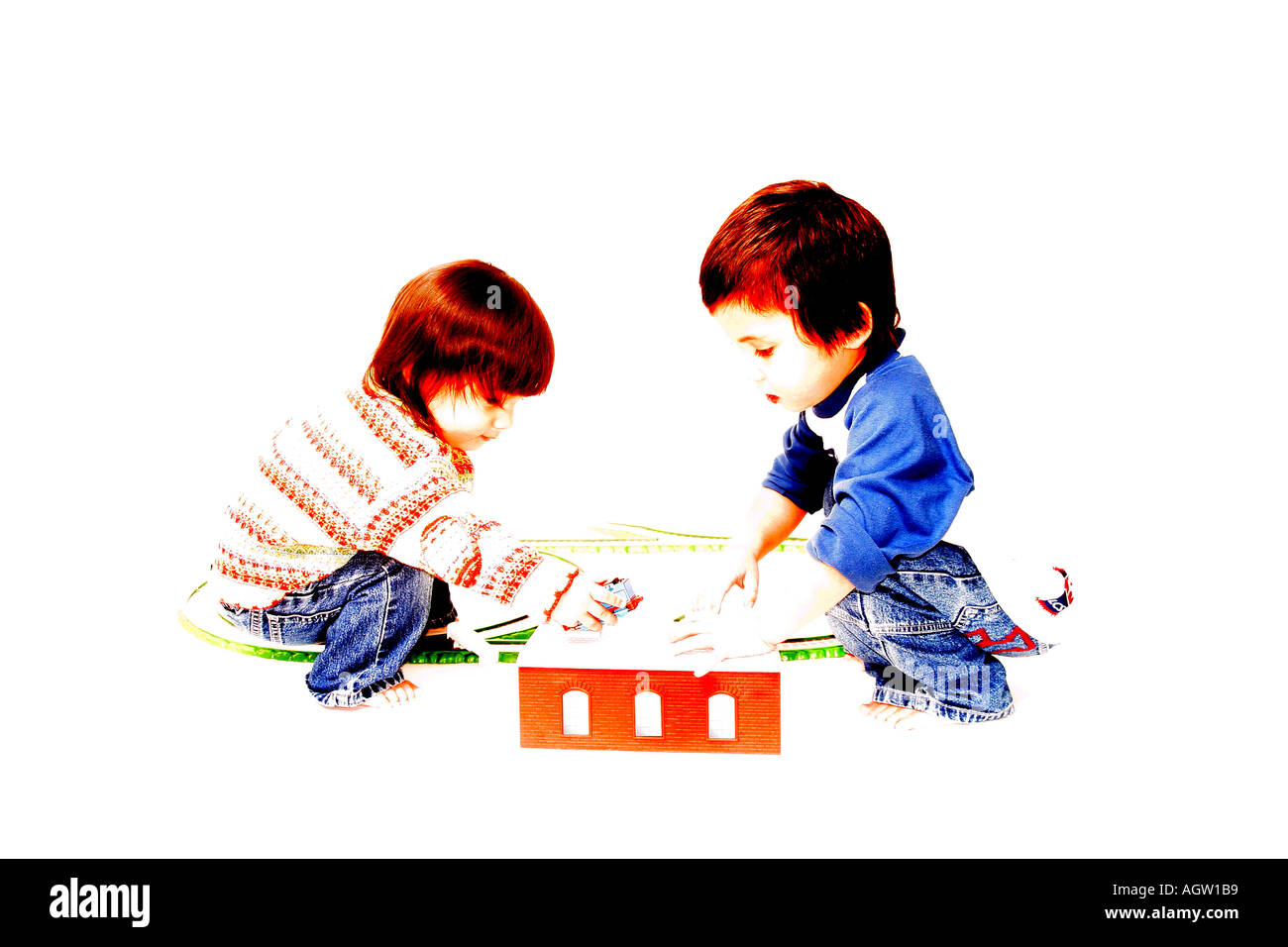 The Fenn family Anna Grace and Sammy playing trains Stock Photo - Alamy