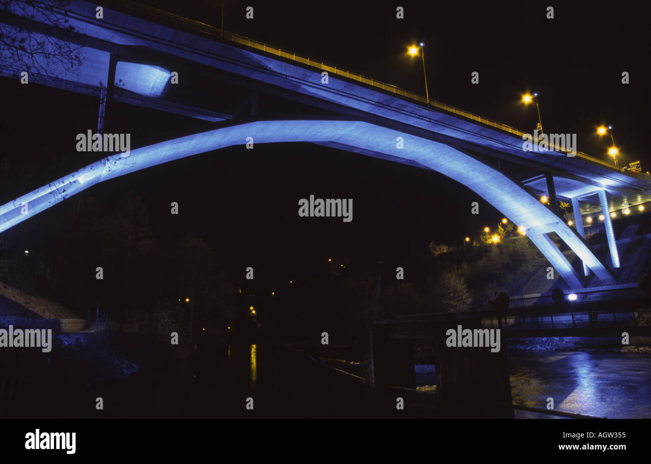 Blue Illuminated Concrete Road Bridge Stock Photo - Alamy