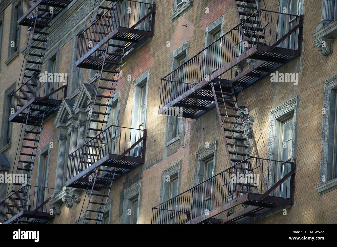 New York City Architecture brick and iron fire escape with Roman ...