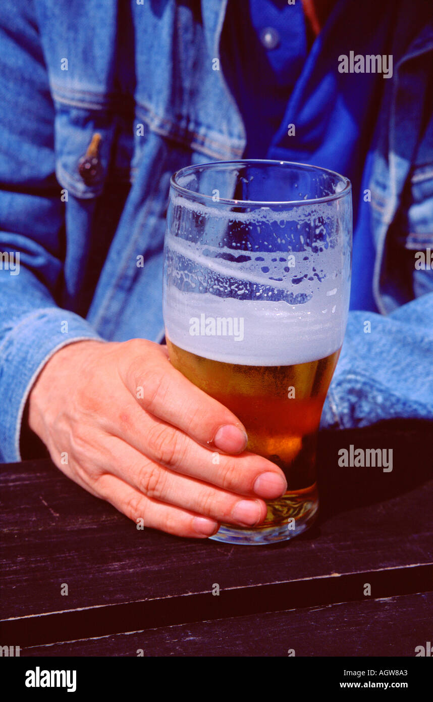 Half drunk glass of lager beer hi-res stock photography and images - Alamy