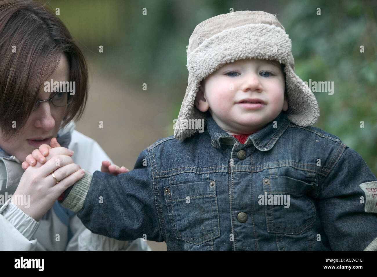 child being comforted by mother after falling over Stock Photo - Alamy