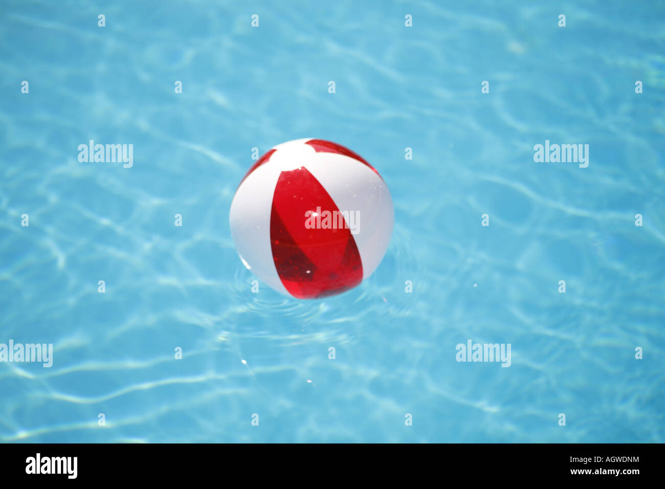 Ball in swimming pool Stock Photo - Alamy