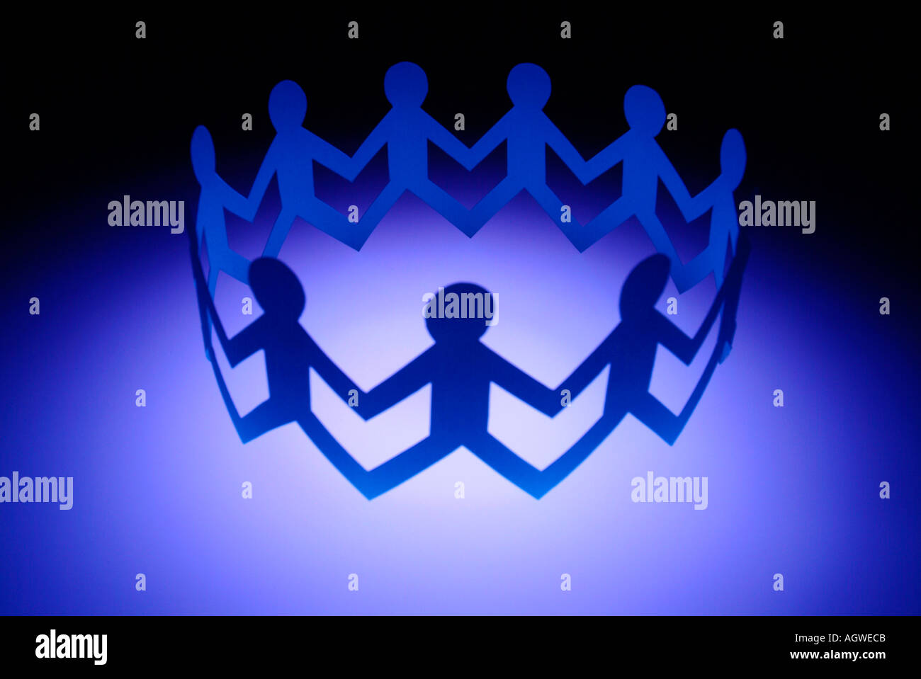 Circle of paper chain people Stock Photo - Alamy