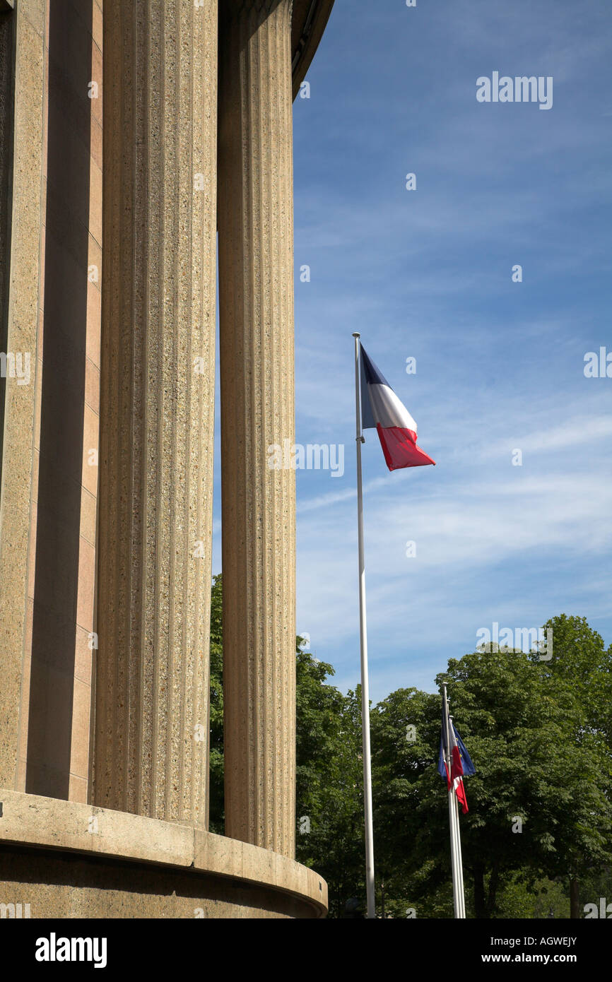 Building with pillars and french flag Stock Photo - Alamy