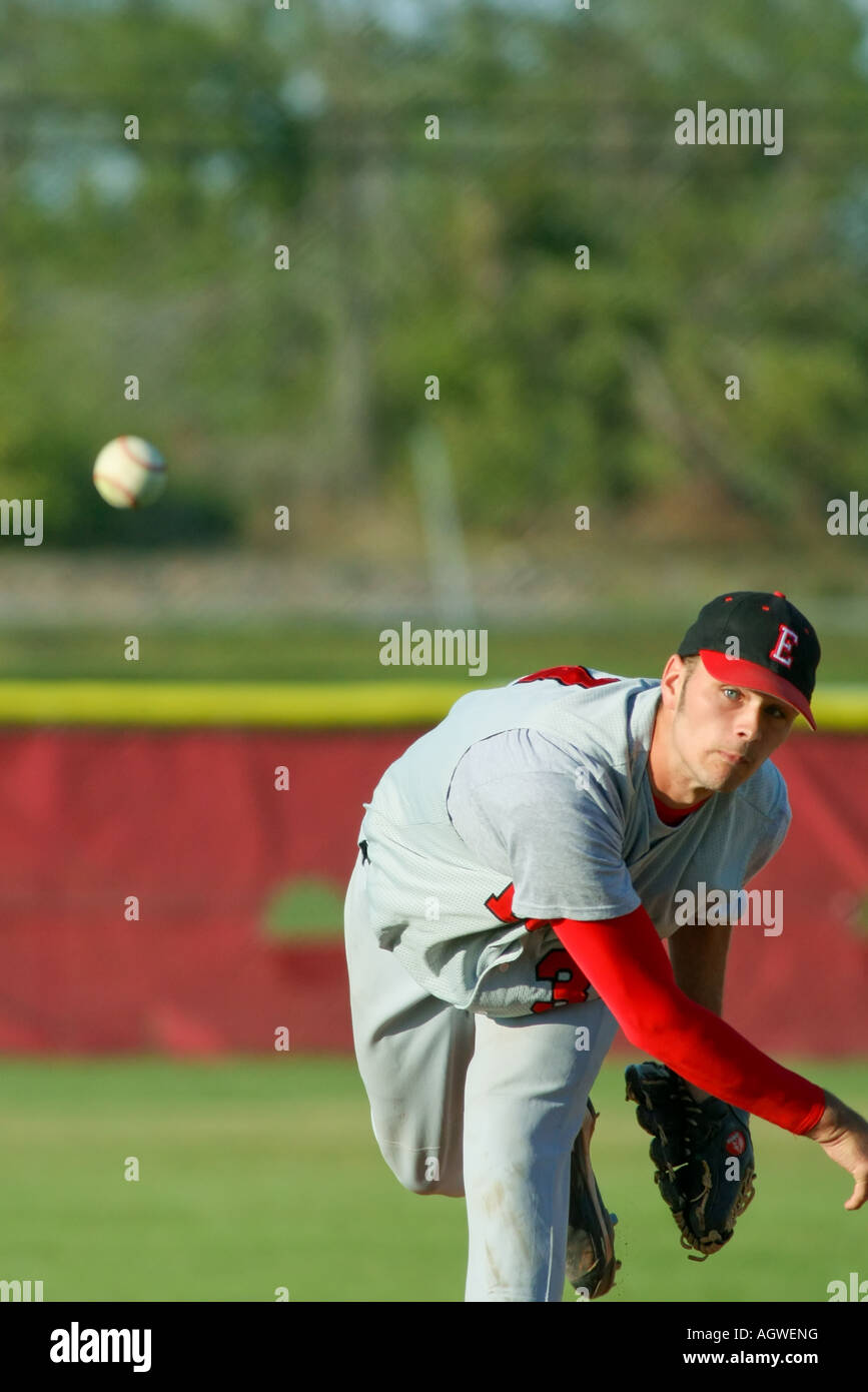 College baseball player pitching Stock Photo - Alamy