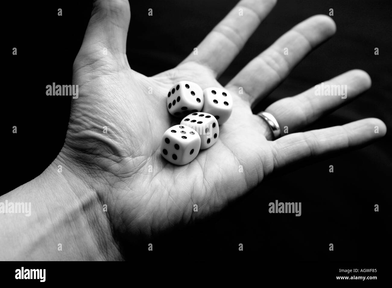 Dice in palm hi-res stock photography and images - Alamy