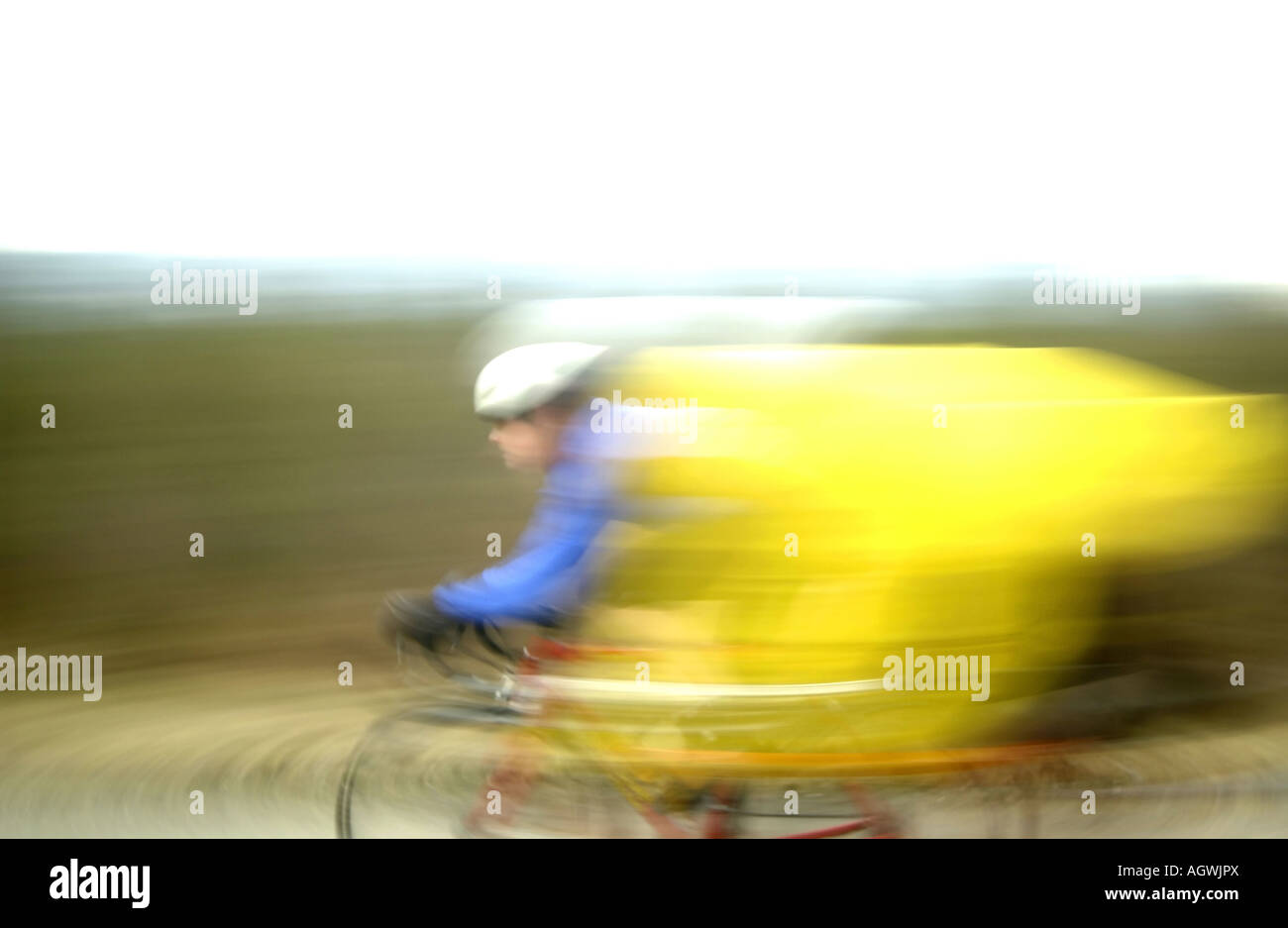 2 cyclists riding along side a highway Stock Photo - Alamy