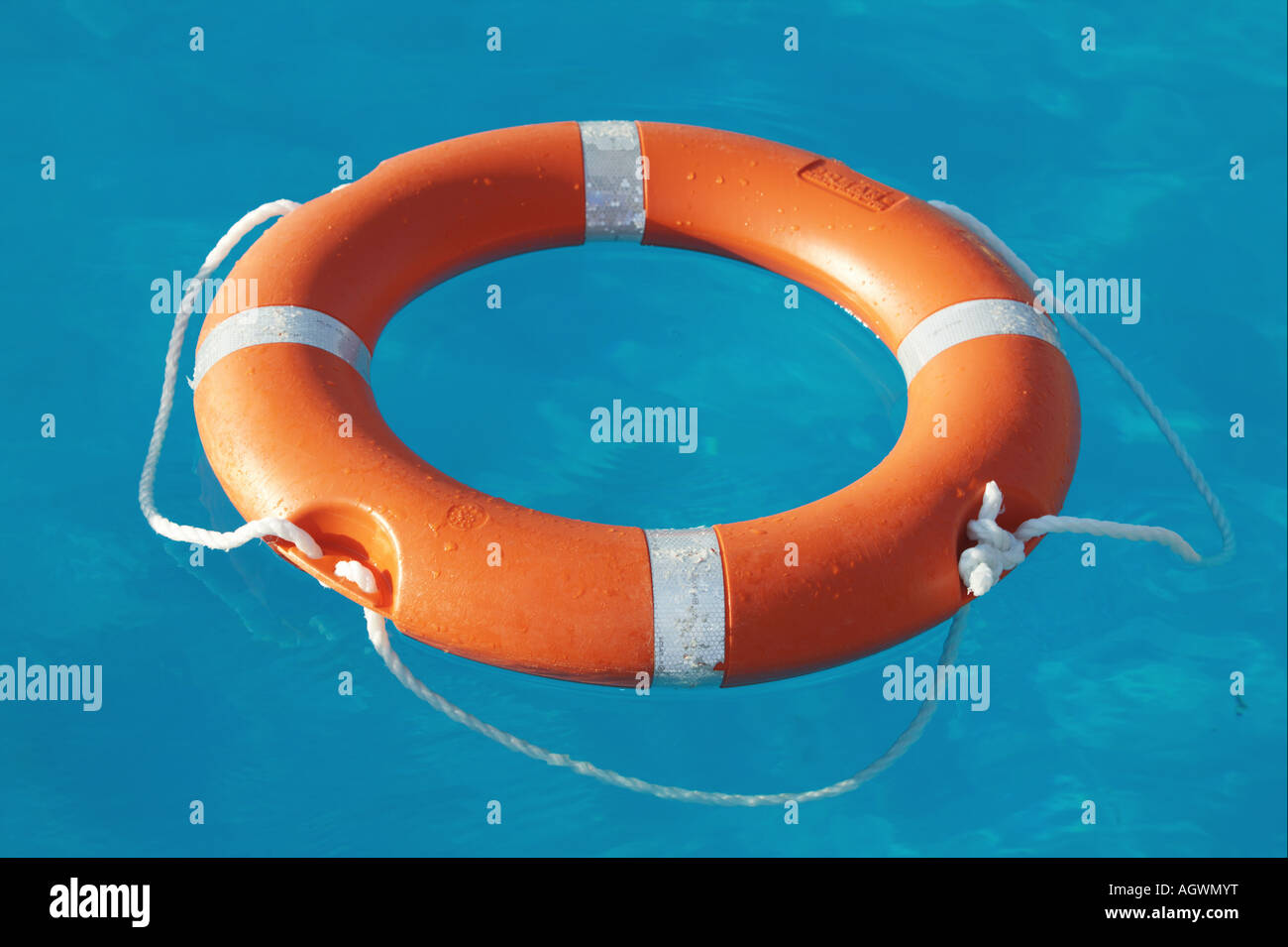 Lifebuoy in water pool Stock Photo - Alamy