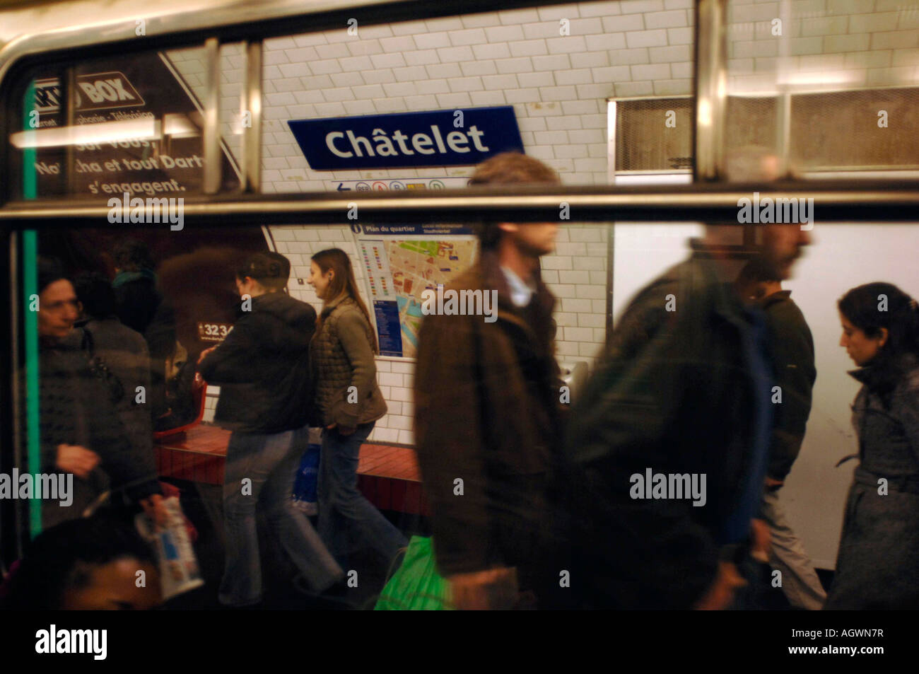 Travelling on a train of the Paris metro through Chatelet station with ...