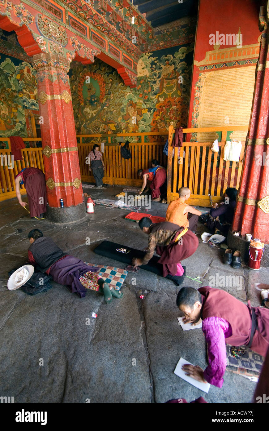 TIBET China Lhasa Buddhist pilgrims pray and prostrate themselves in ...