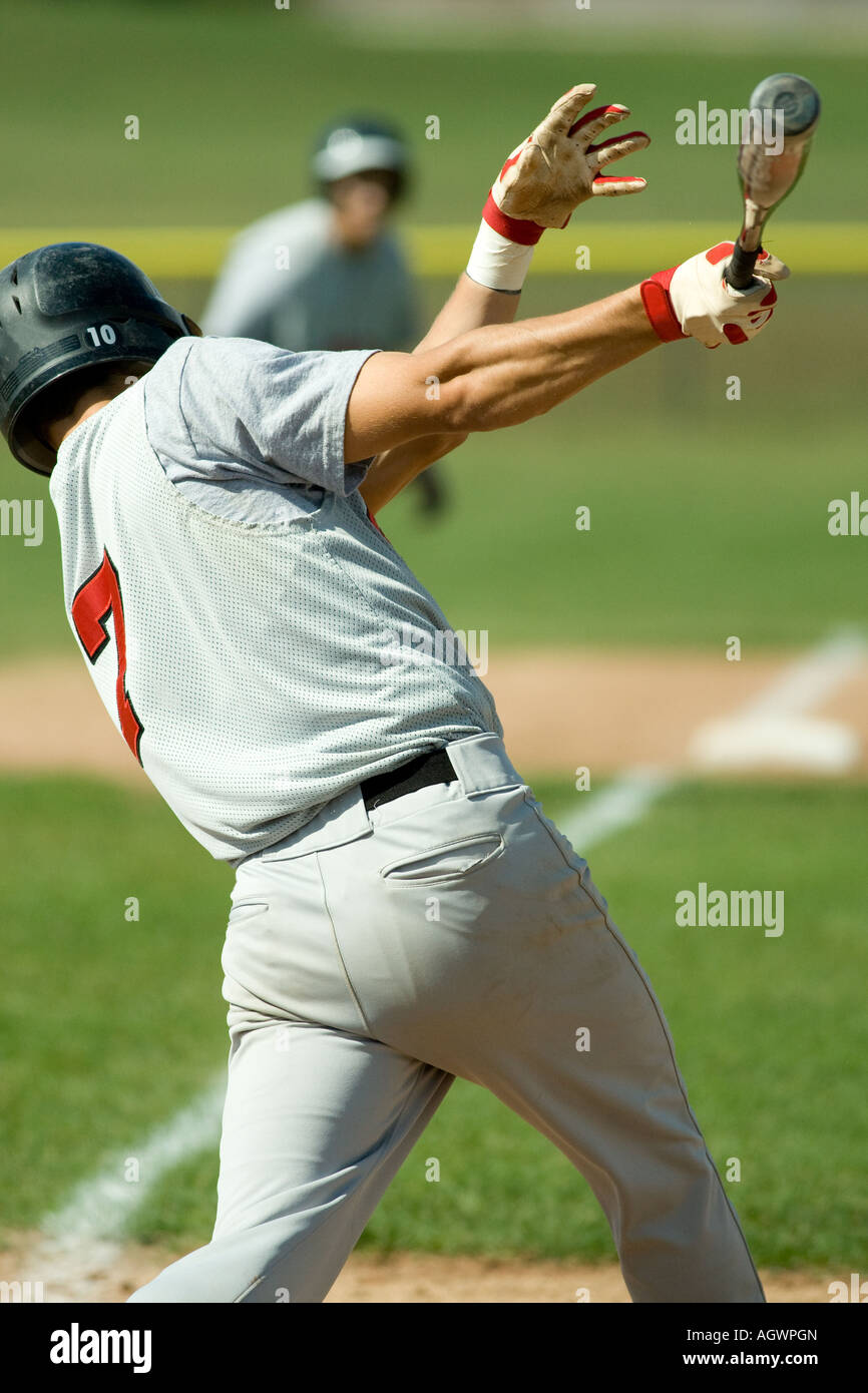 A college baseball batter swinging Stock Photo - Alamy