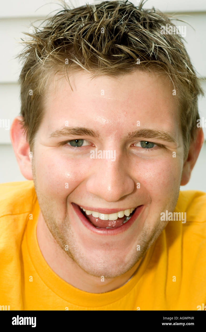 Smiling young Caucasian man Stock Photo - Alamy
