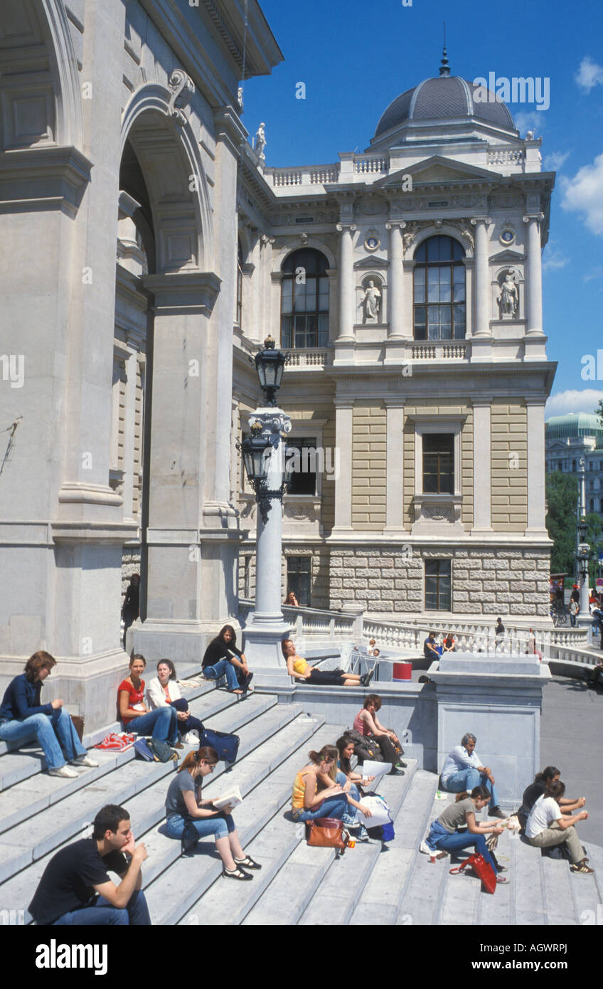 Students sitting in front of the university building in Vienna Austria ...