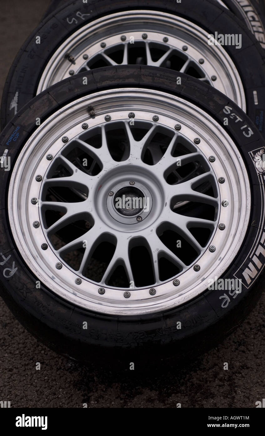 Race car wheels stacked await fitment to the car Stock Photo - Alamy