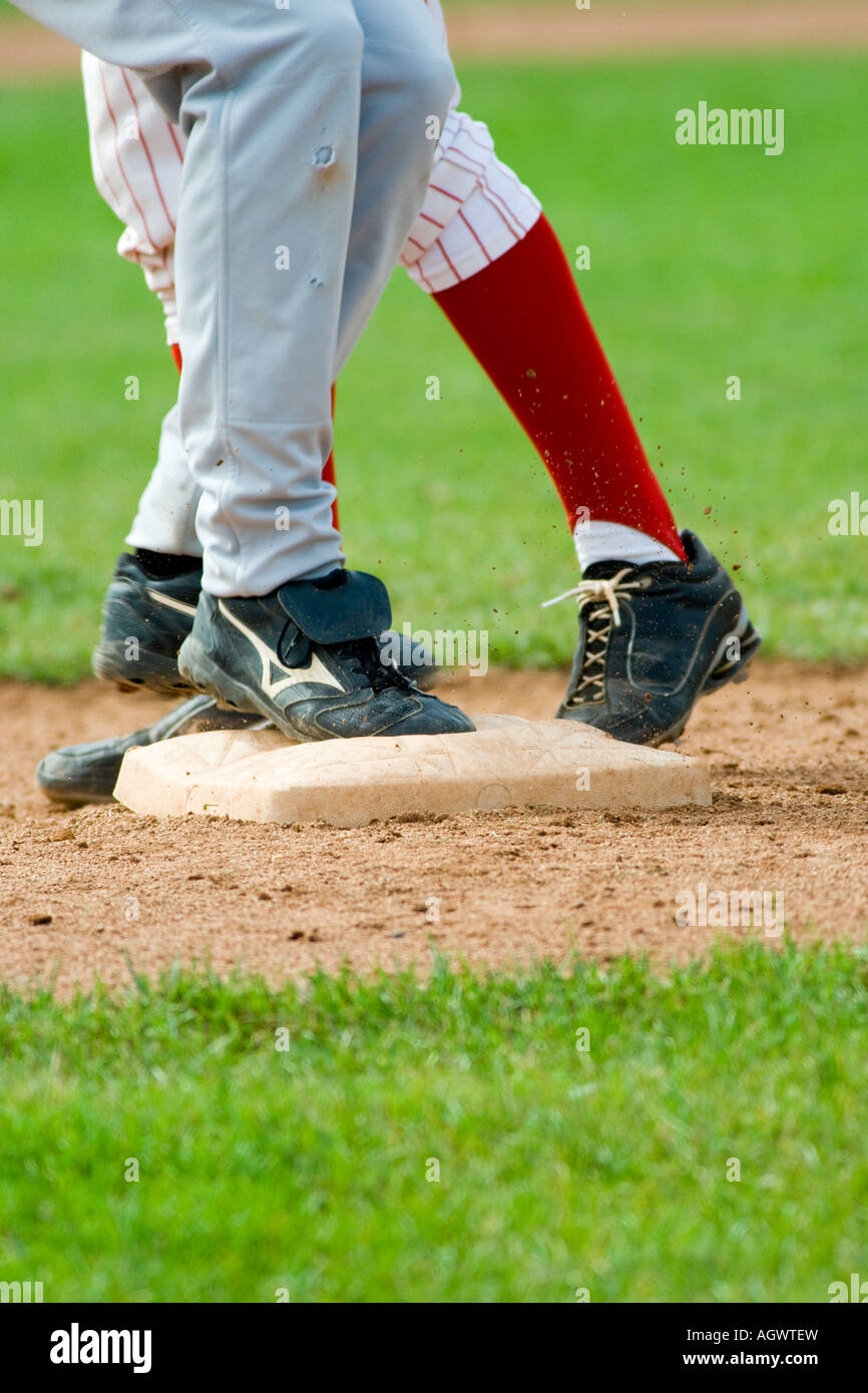 College baseball players on base Stock Photo - Alamy