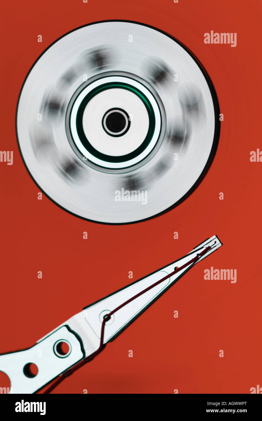 Computer hard drive with a spinning disc in red Stock Photo - Alamy