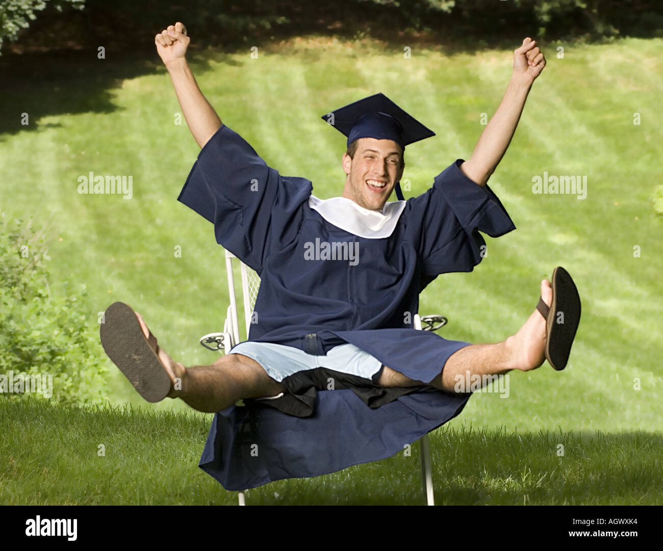 High school graduate celebrating graduation from school Stock Photo - Alamy