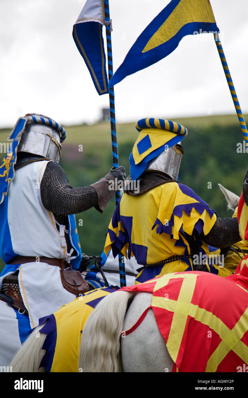 Medieval knights on horseback holding lance during reenactment ...
