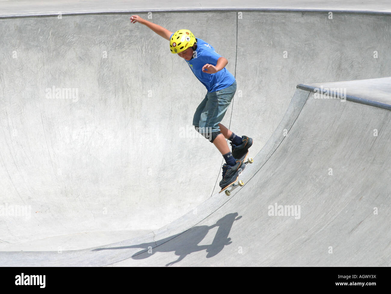 Boy skating in skate park Stock Photo - Alamy