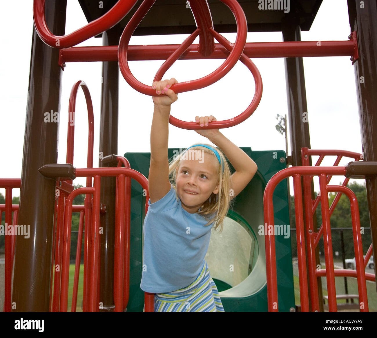 Child in a playground Stock Photo - Alamy