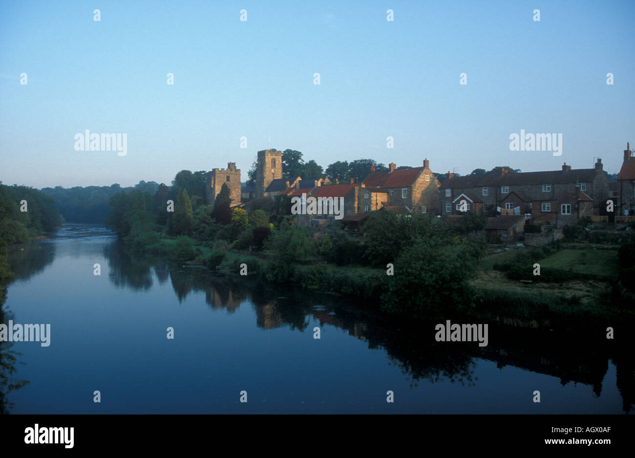 A view of West Tanfield village looking across the River Ure in North ...