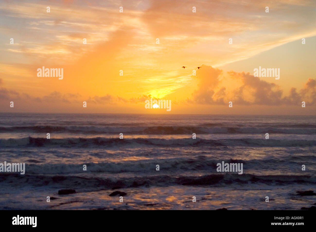 Red sunset over the Pacific Ocean Stock Photo - Alamy