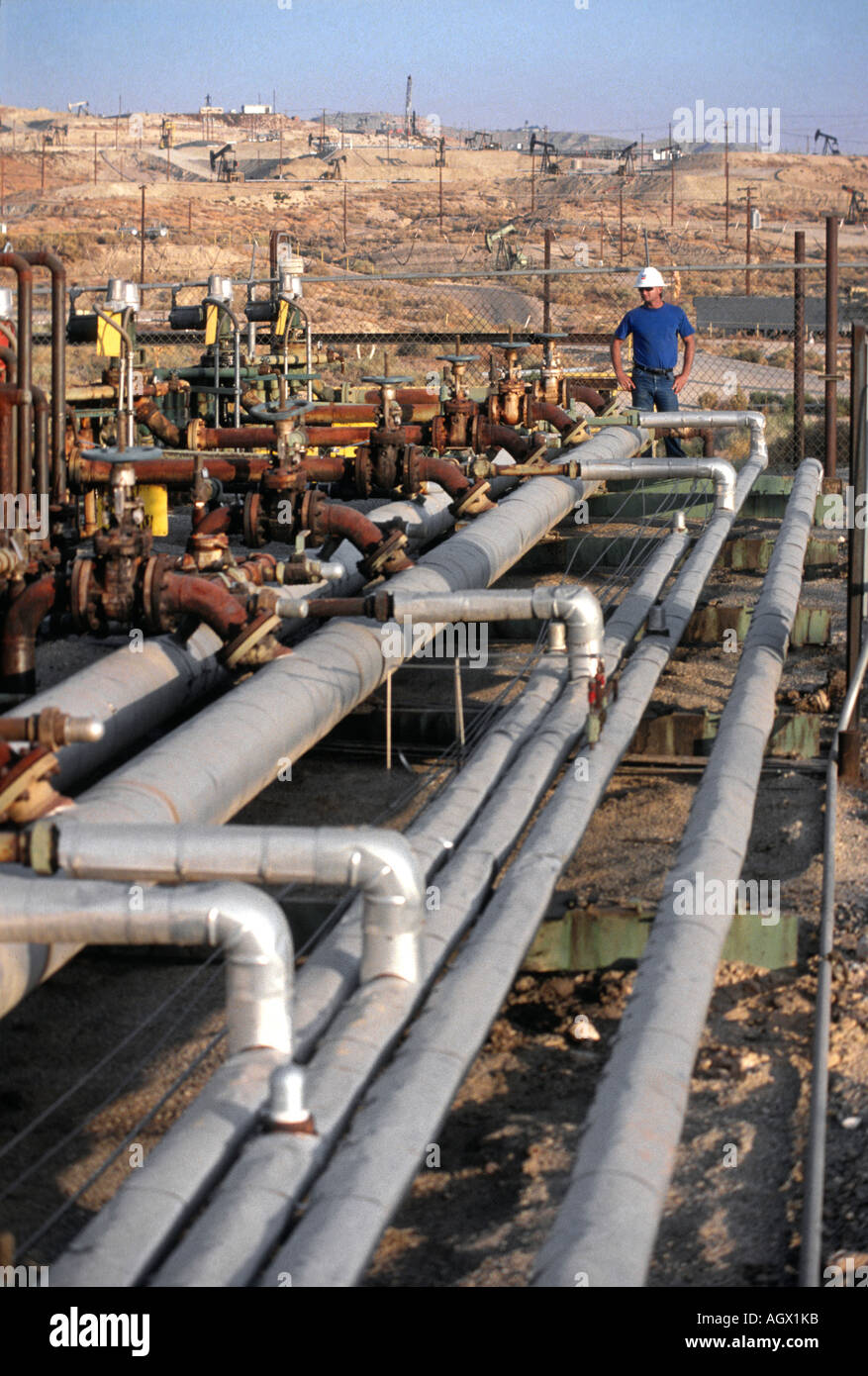 Worker in oil lines in Taft California Stock Photo - Alamy