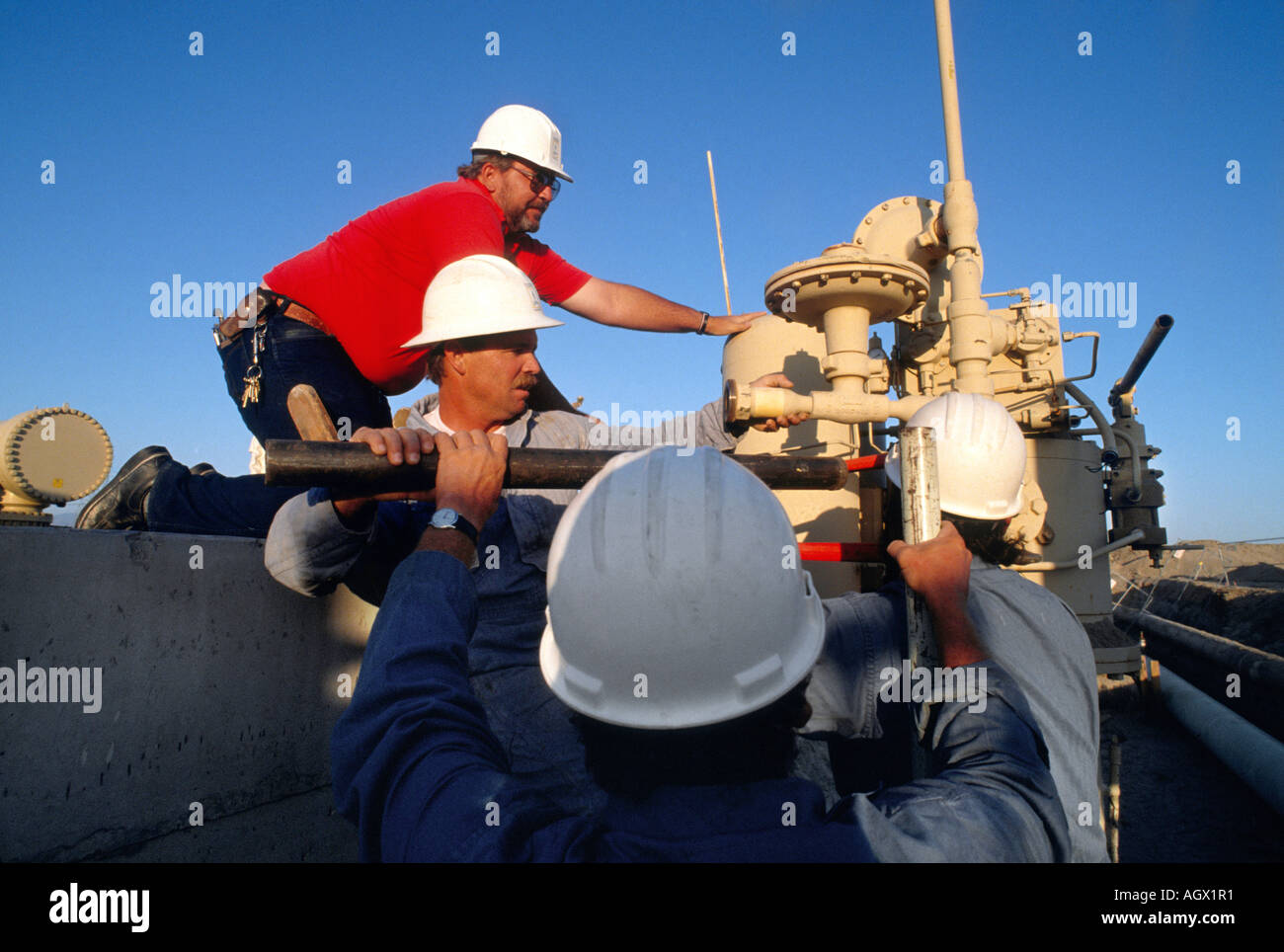 Men work on assembly of a gas pipeline Stock Photo - Alamy