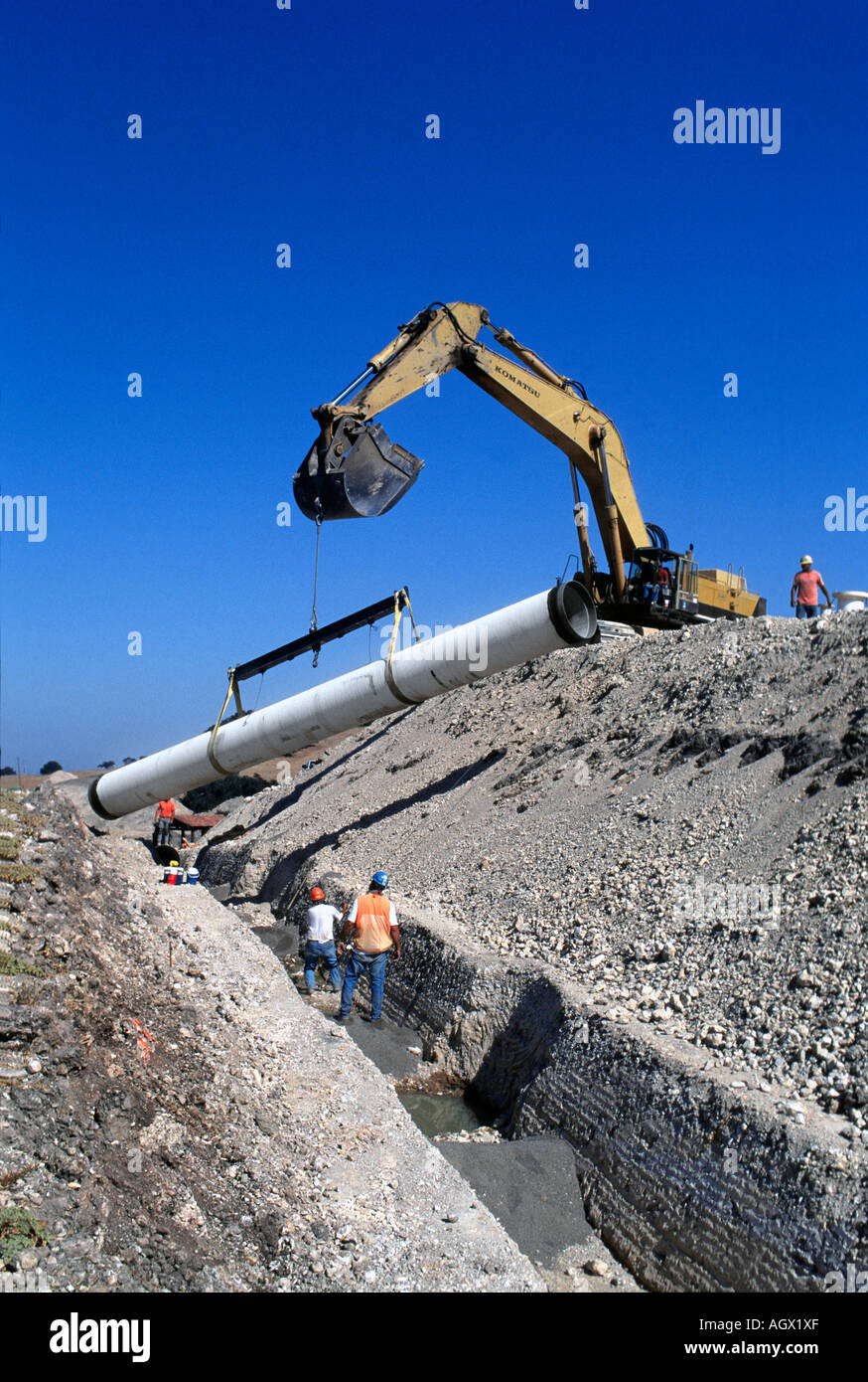 A pipe is placed in line for a water pipeline in Central California ...