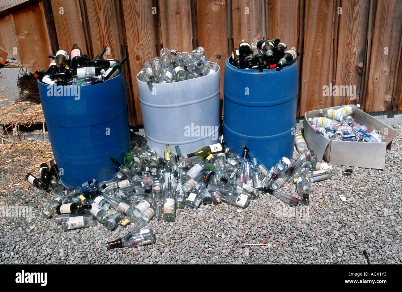 Barrels overflow with recycling material Stock Photo - Alamy