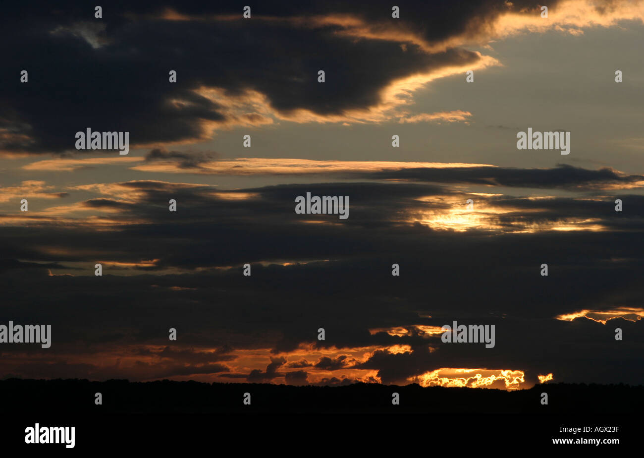 A dark sunset sky in summer Stock Photo - Alamy