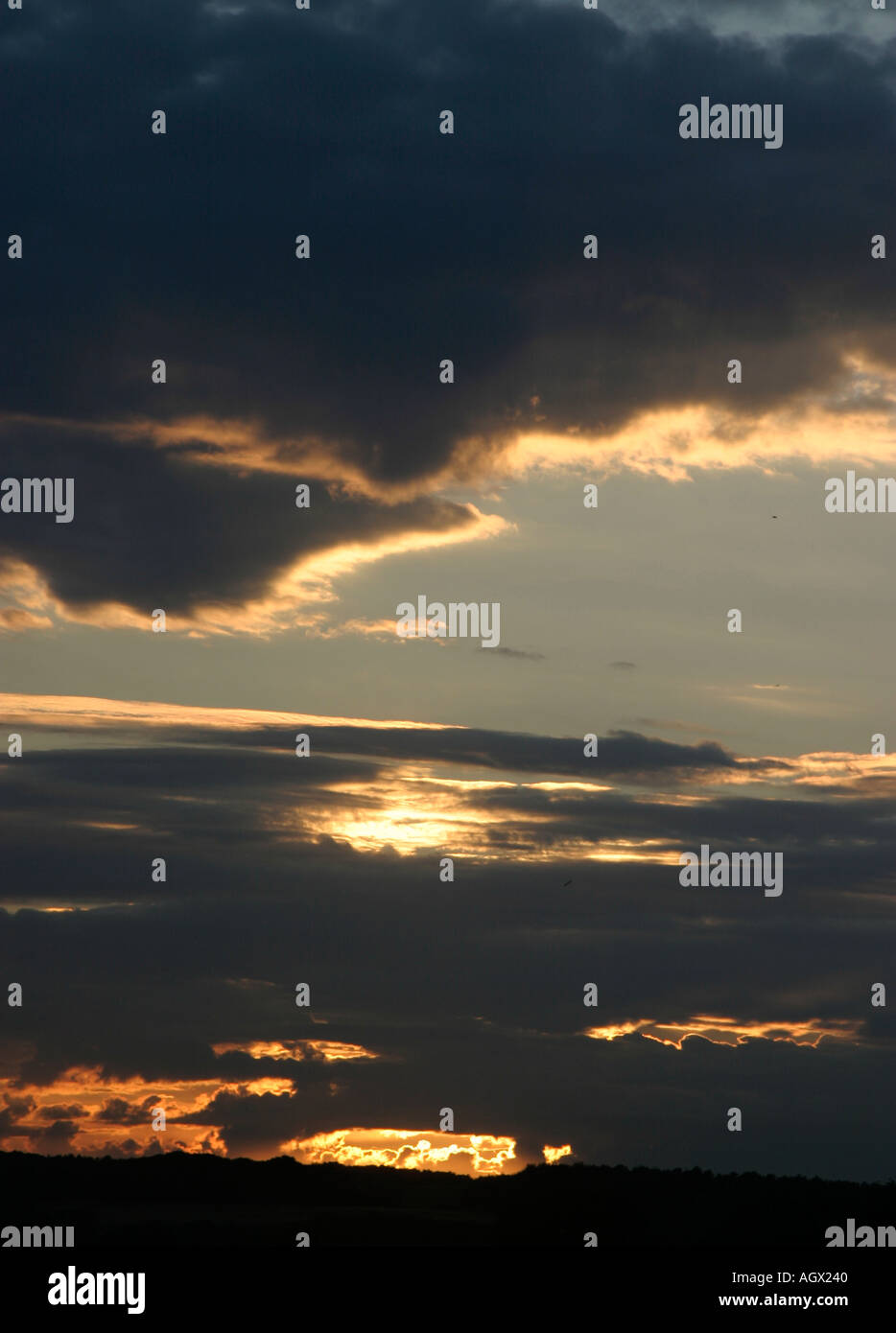 A dark sunset sky in summer Stock Photo - Alamy