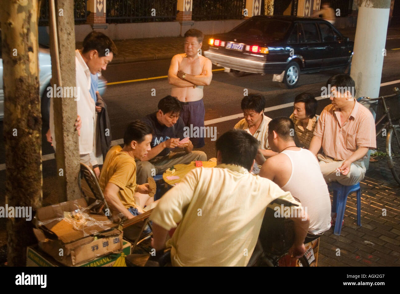 Group men playing cards on hi-res stock photography and images - Alamy