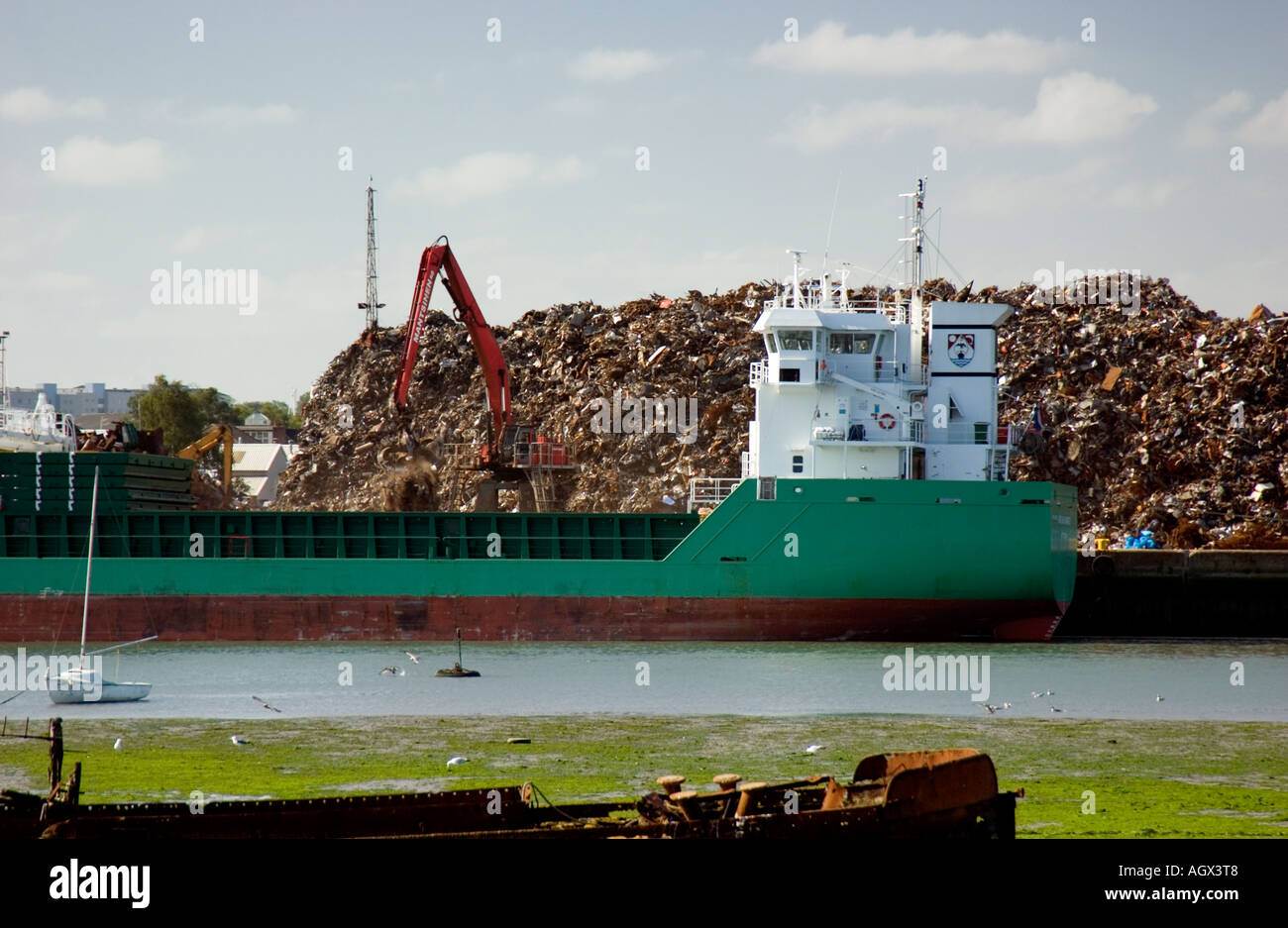 Loading scrap steel into a ship on a wharf in Southampton, England ...
