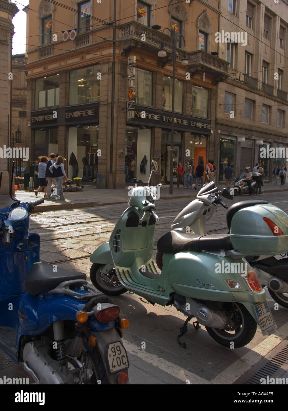 Scooters parked on sidewalk of Via Torrino in Milan Italy Stock Photo ...