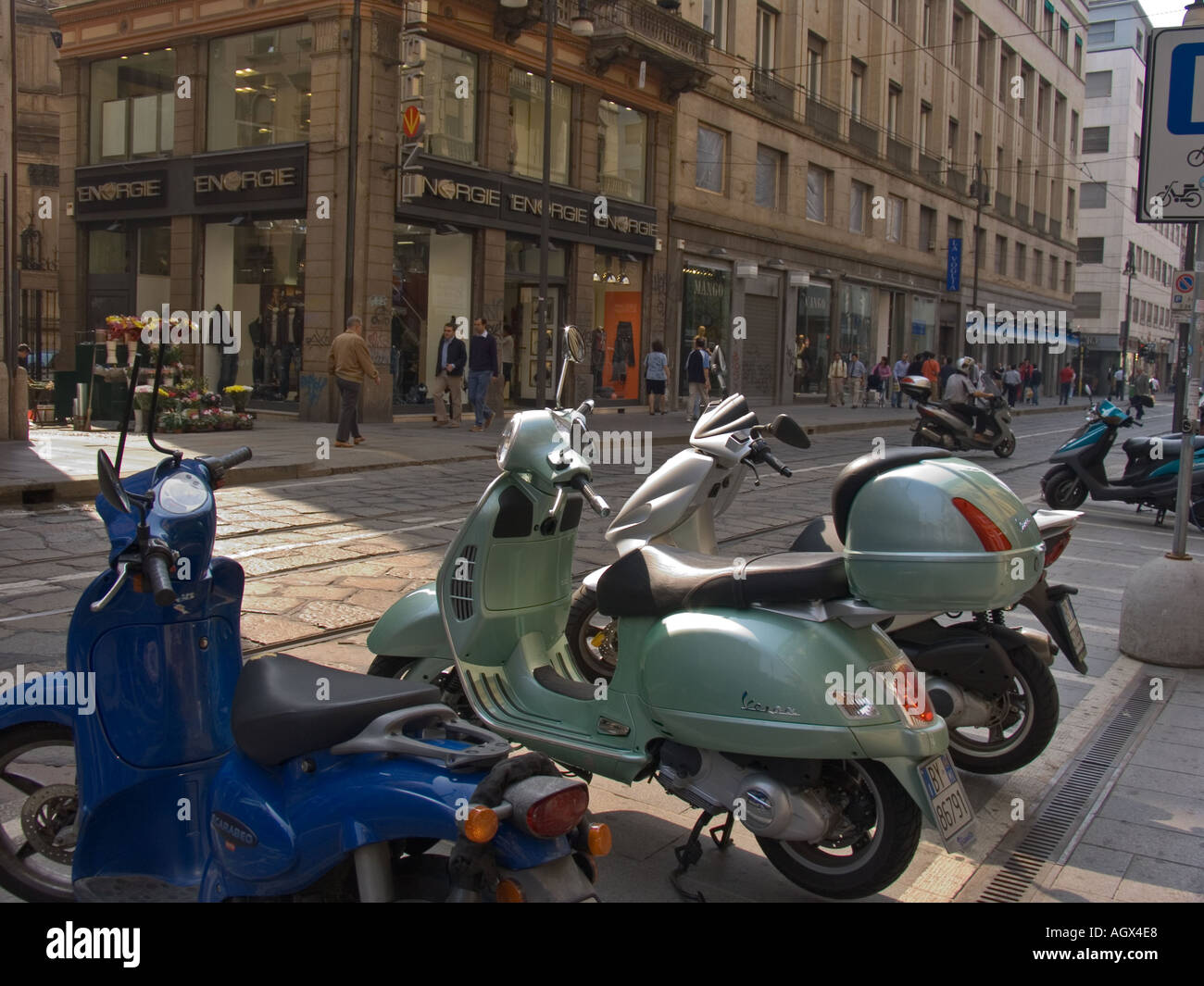 Scooters parked on sidewalk of Via Torrino in Milan Italy Stock Photo ...