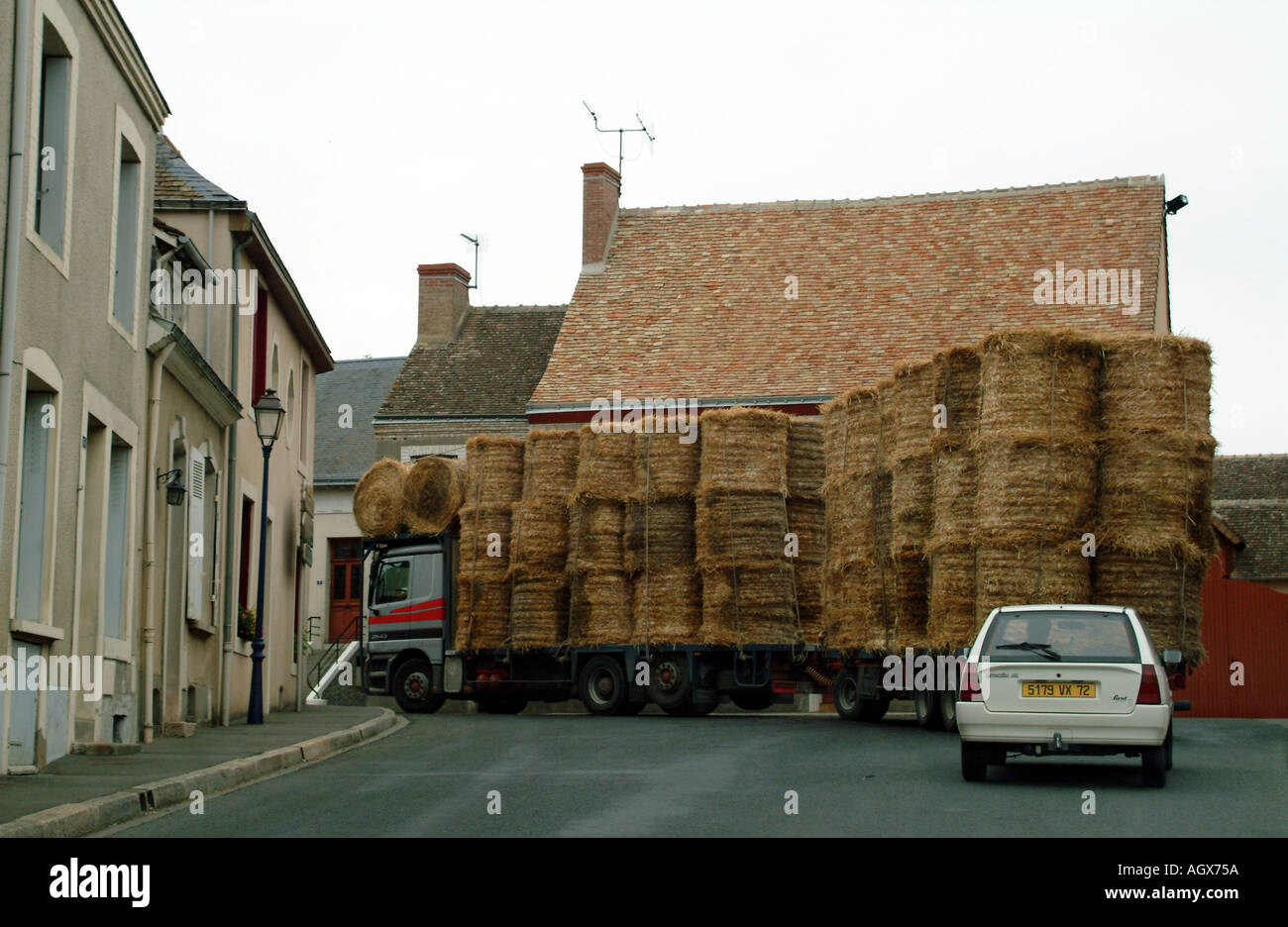 Flat Platform Lorry and trailer fully laden carrying a load bales of ...