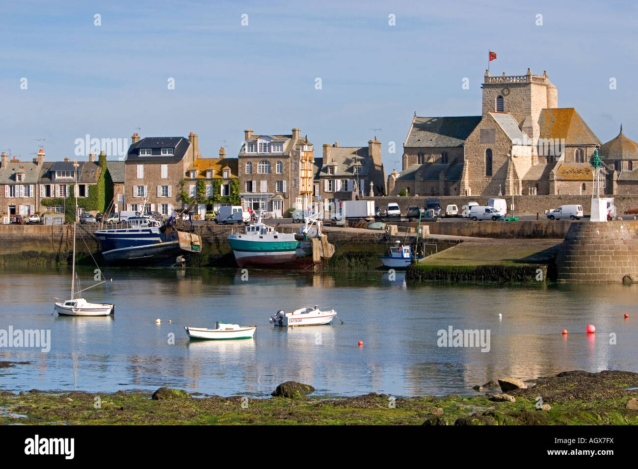 The harbor at the village of Barfleur in the region of Basse Normandie ...