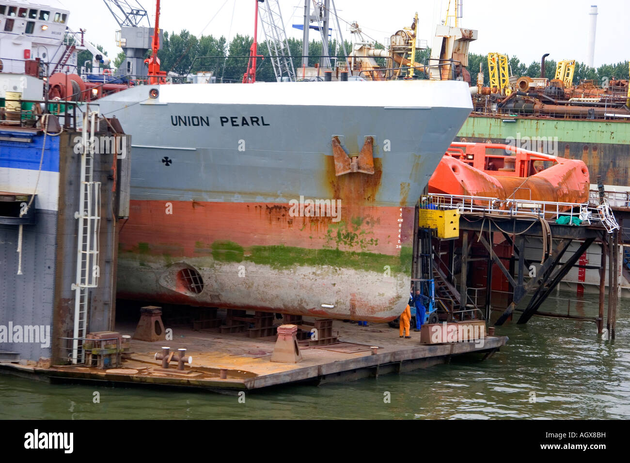 Container ship in dry dock at the Port of Rotterdam Netherlands Stock ...