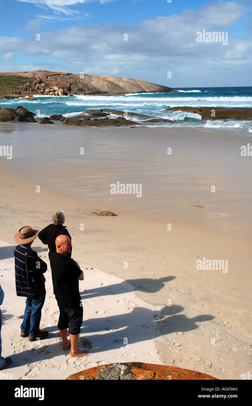 Ecotourist group led by local guide Gary Muir barefoot enjoy remote ...
