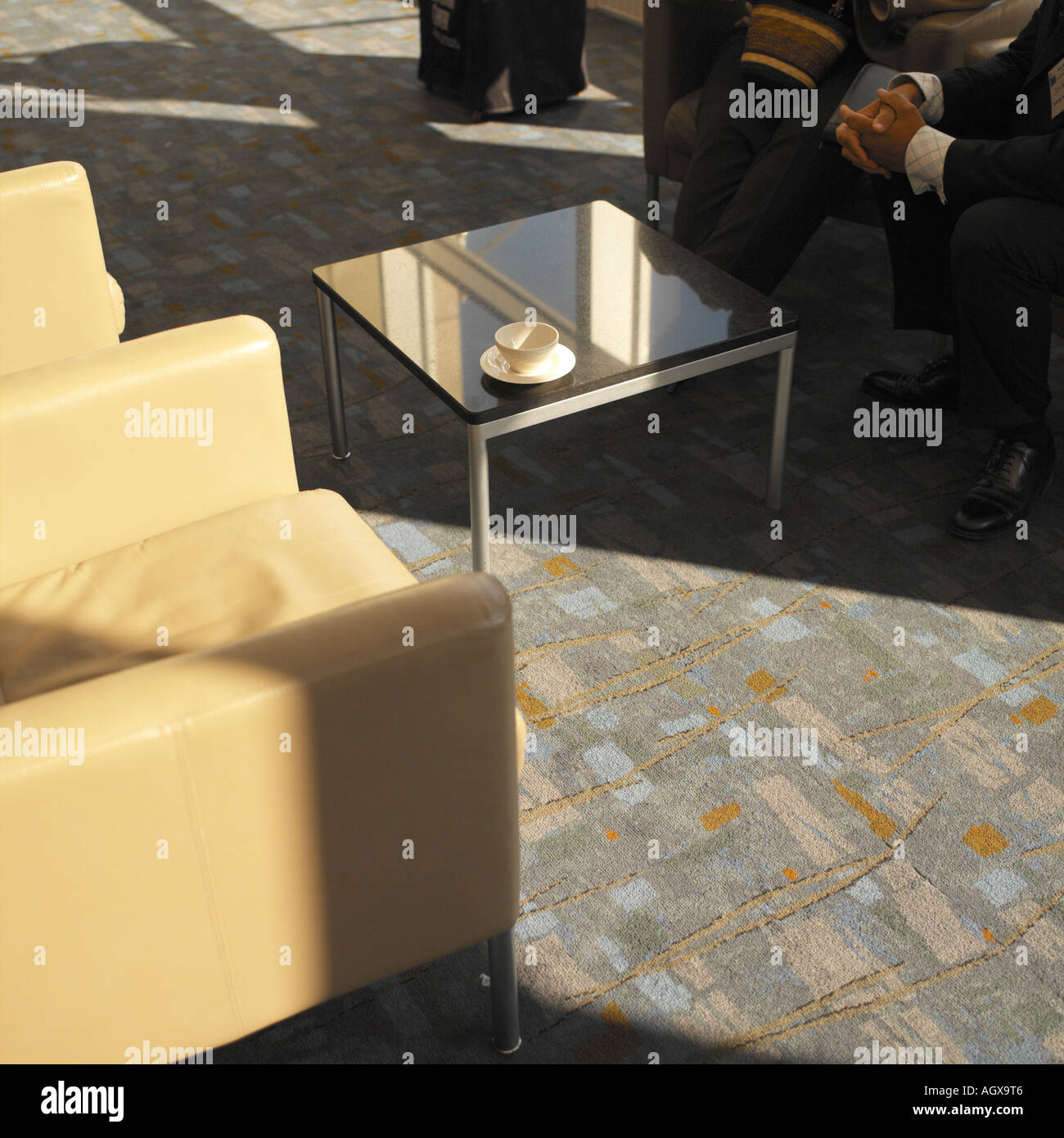 Modern Office Chair and Coffee Table Stock Photo - Alamy