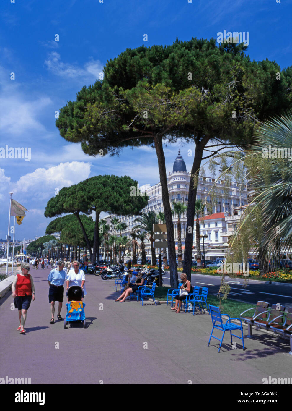 Cannes, Cote d'Azur, France. Carlton Hotel and people walking along the ...
