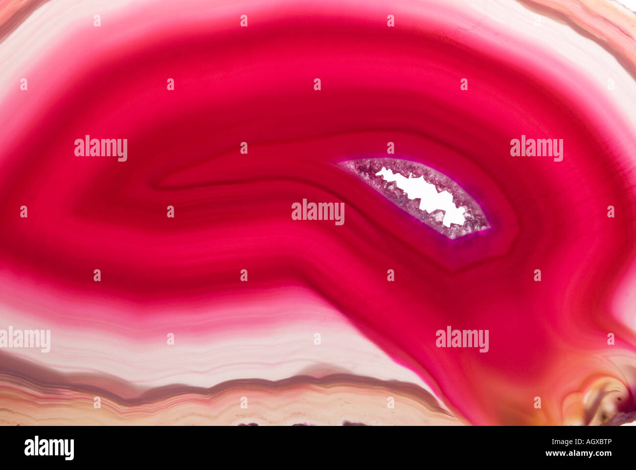 Slice across red Geode Stock Photo - Alamy