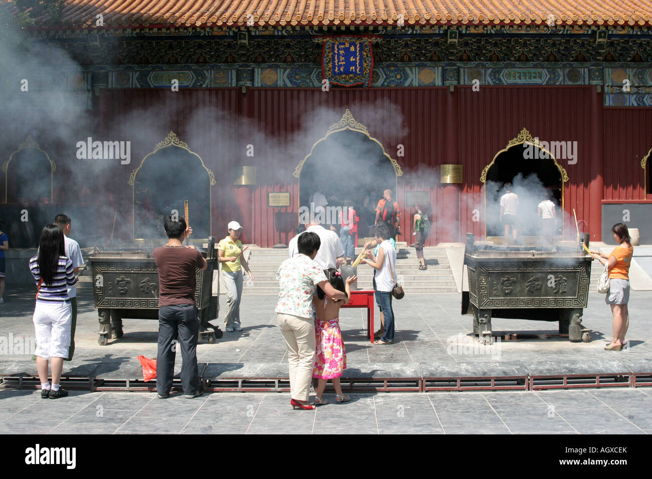 praying in Lama temple Stock Photo - Alamy