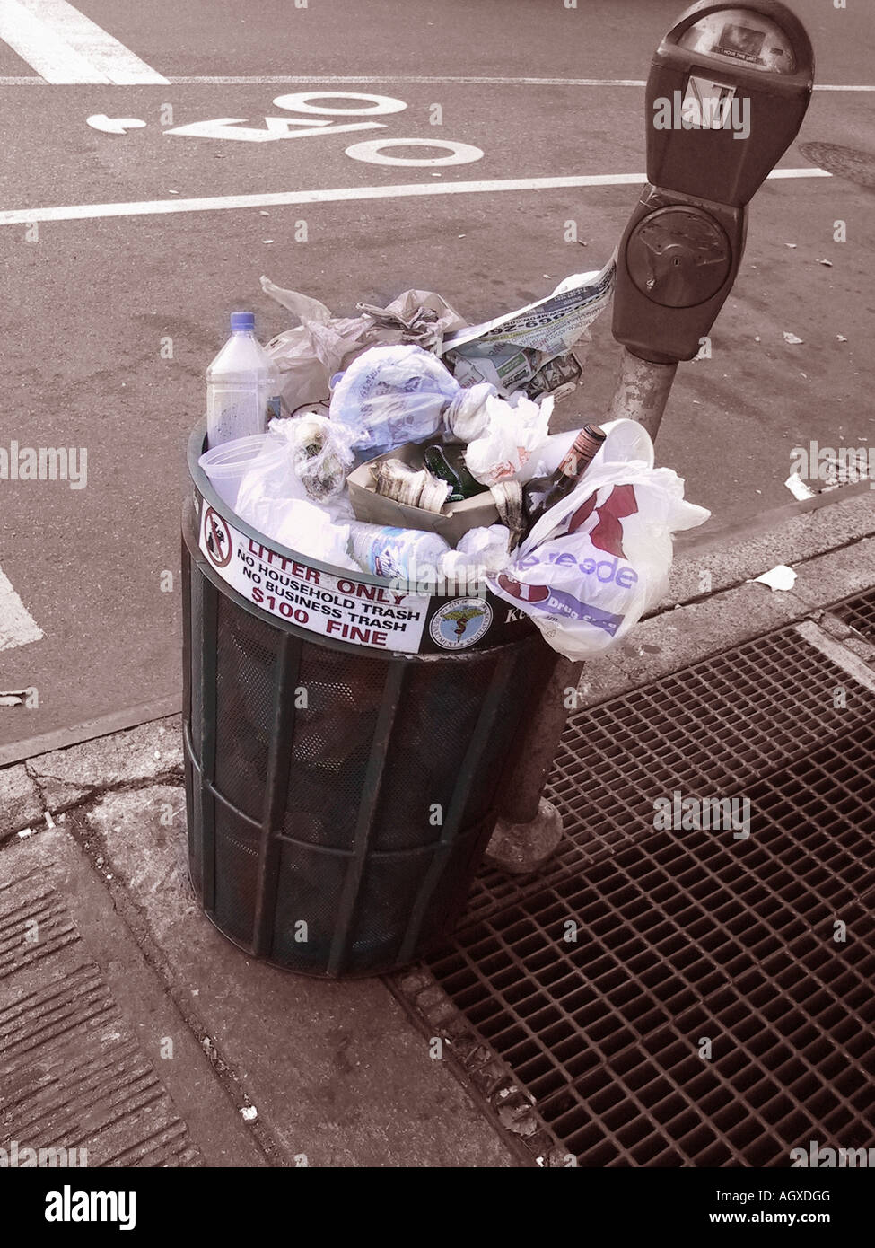 Trash can full, overflowing on the sidewalk in New York City Colorized ...