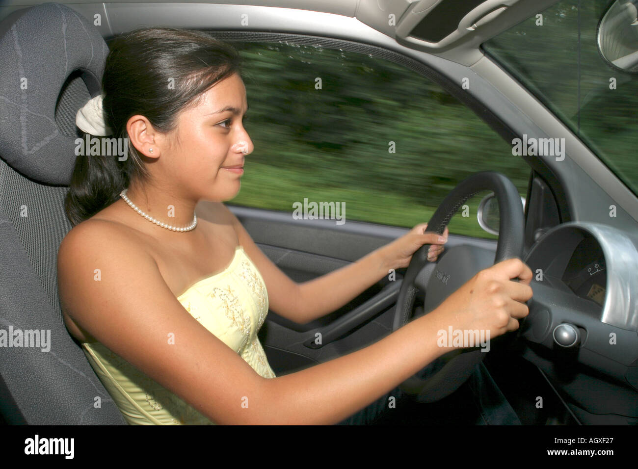 Young woman driving Smart Car Stock Photo - Alamy