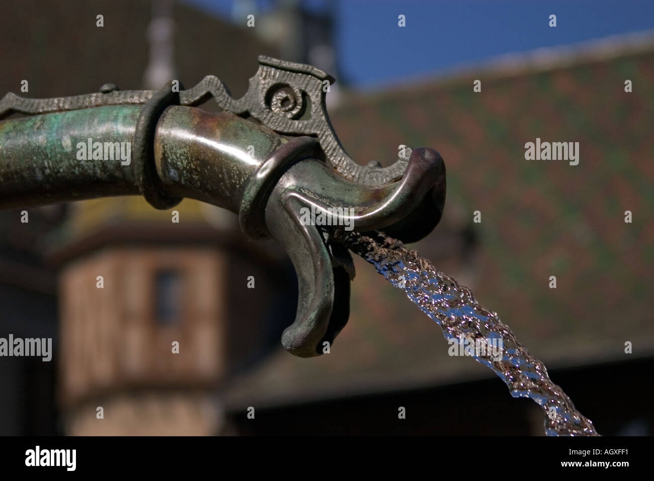 Water spouting from the fountain in front of the Market Hall in Colmar ...