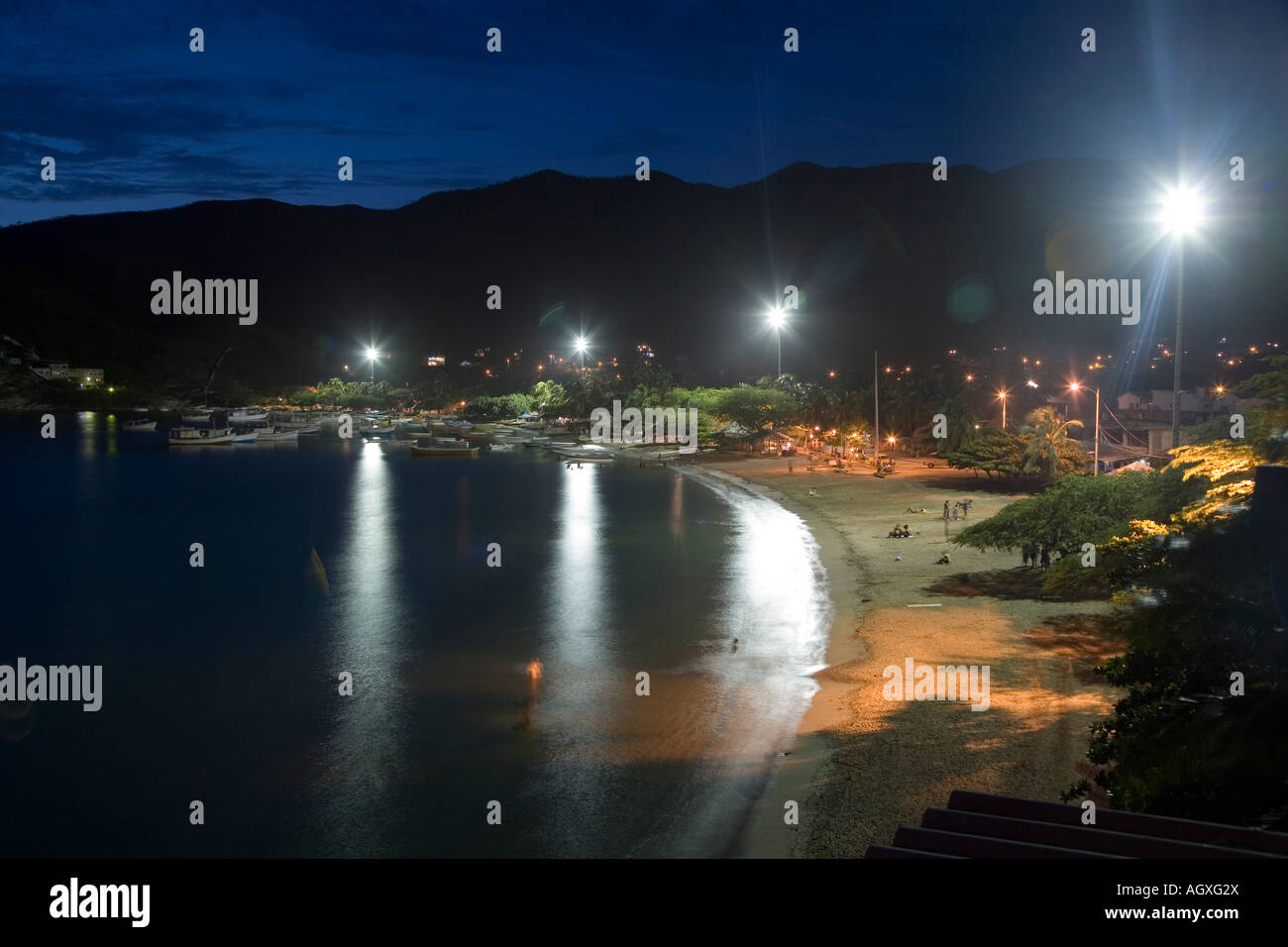Taganga beach by night Stock Photo - Alamy