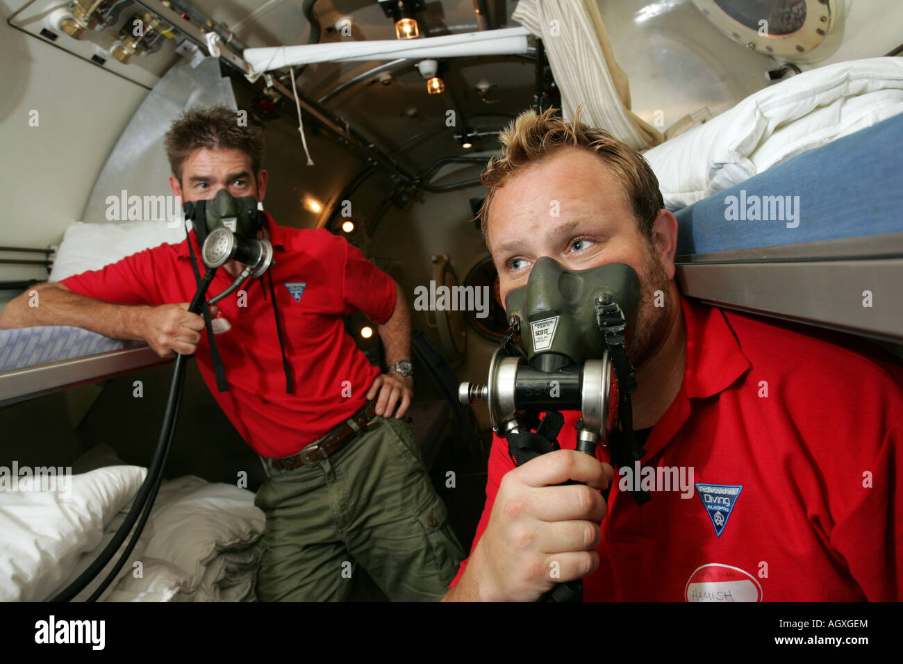 Divers training inside a hyperbaric chamber Stock Photo - Alamy